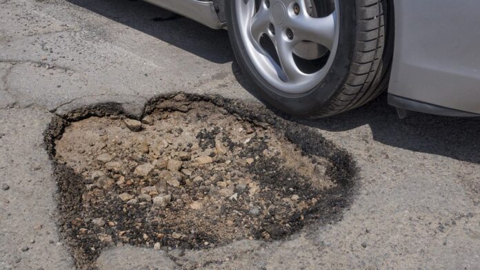 How To Fix Small Potholes And Cracks On Your Driveway - Green Poison