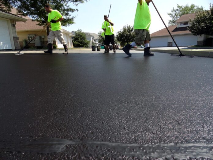 The Importance of Seal Coating Your Asphalt Driveway - Green Poison